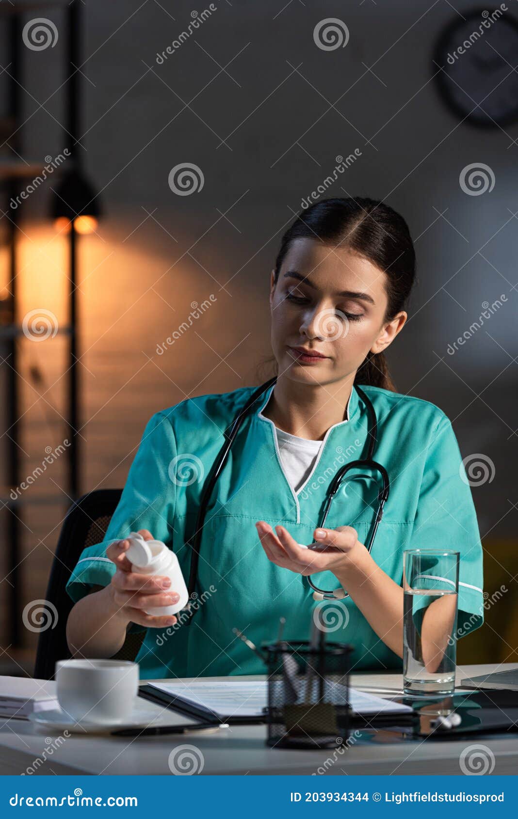 Nurse in Uniform Sitting at Table Stock Photo - Image of european, girl ...