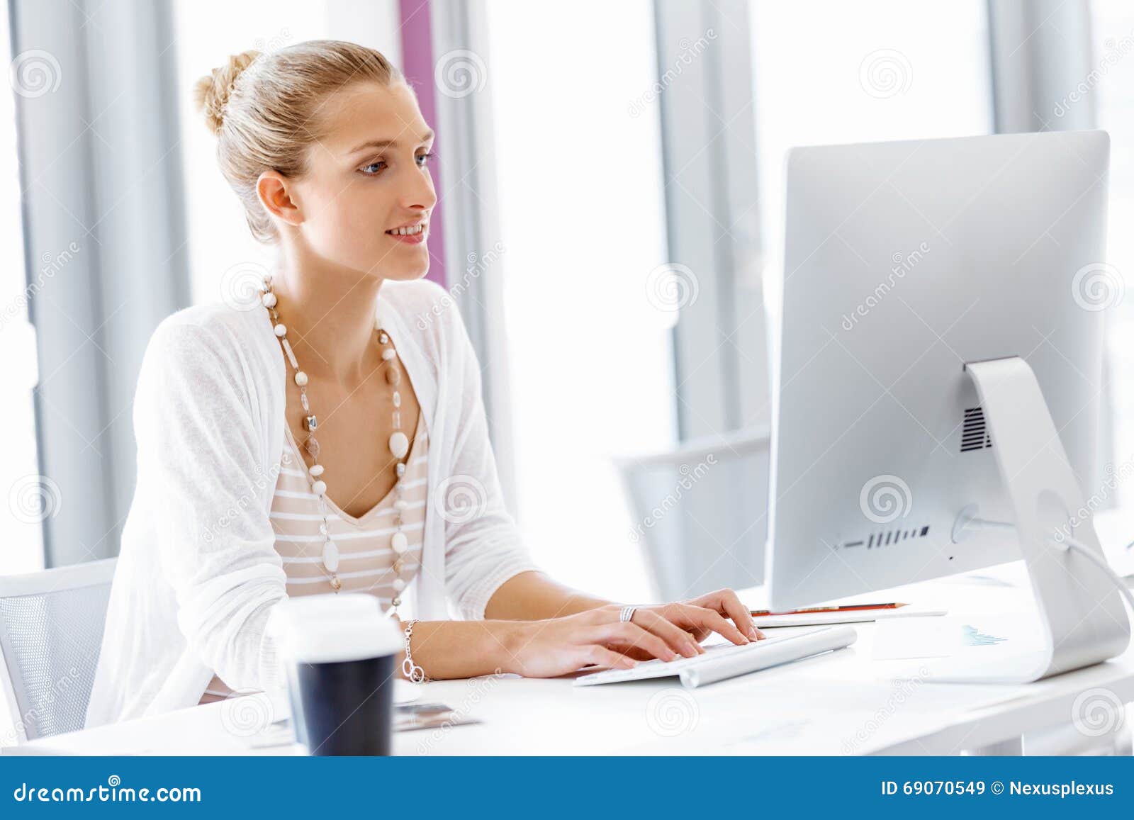 Attractive Office Worker Sitting at Desk Stock Image - Image of ...