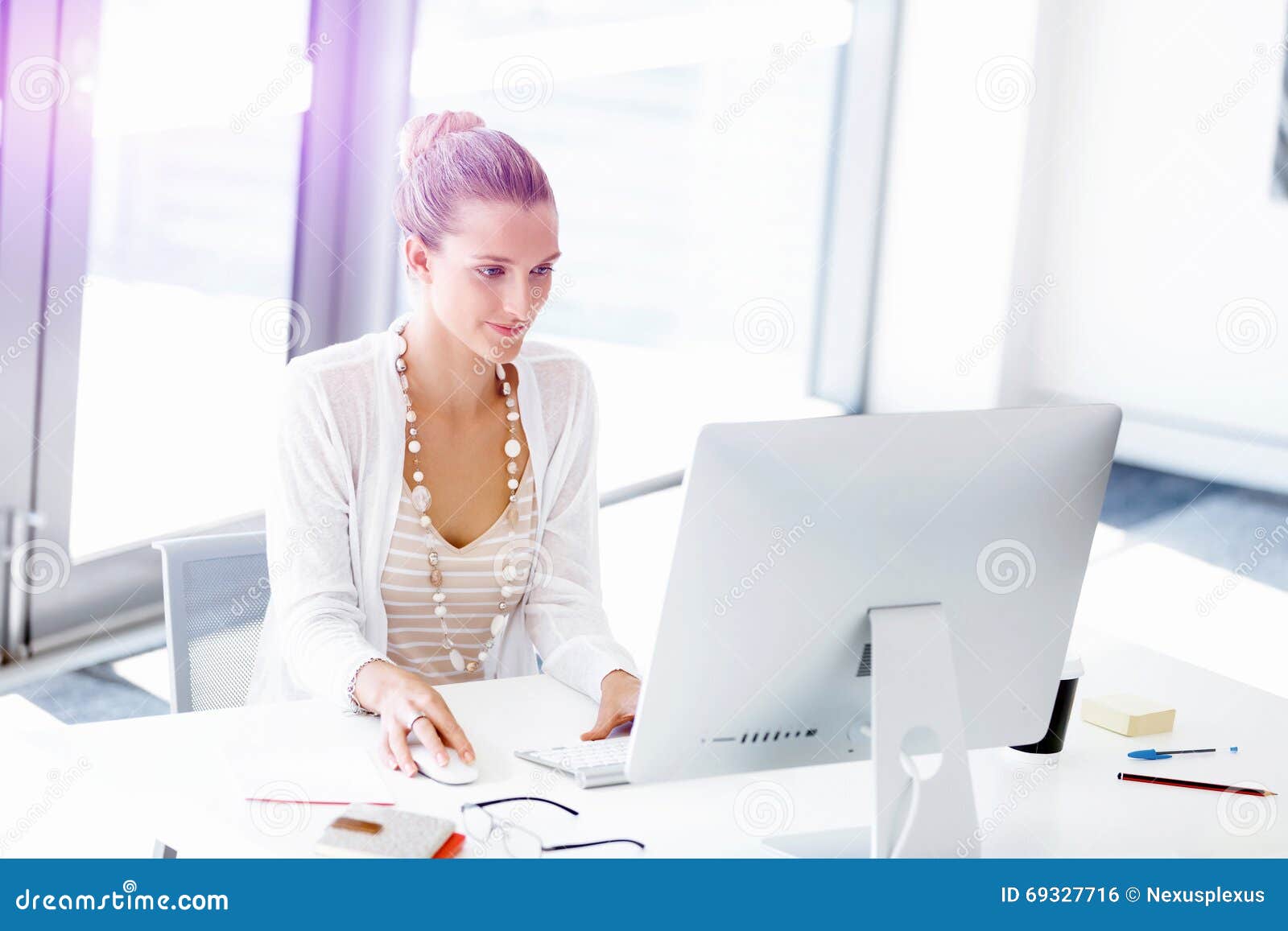 Attractive Office Worker Sitting at Desk Stock Photo - Image of ...