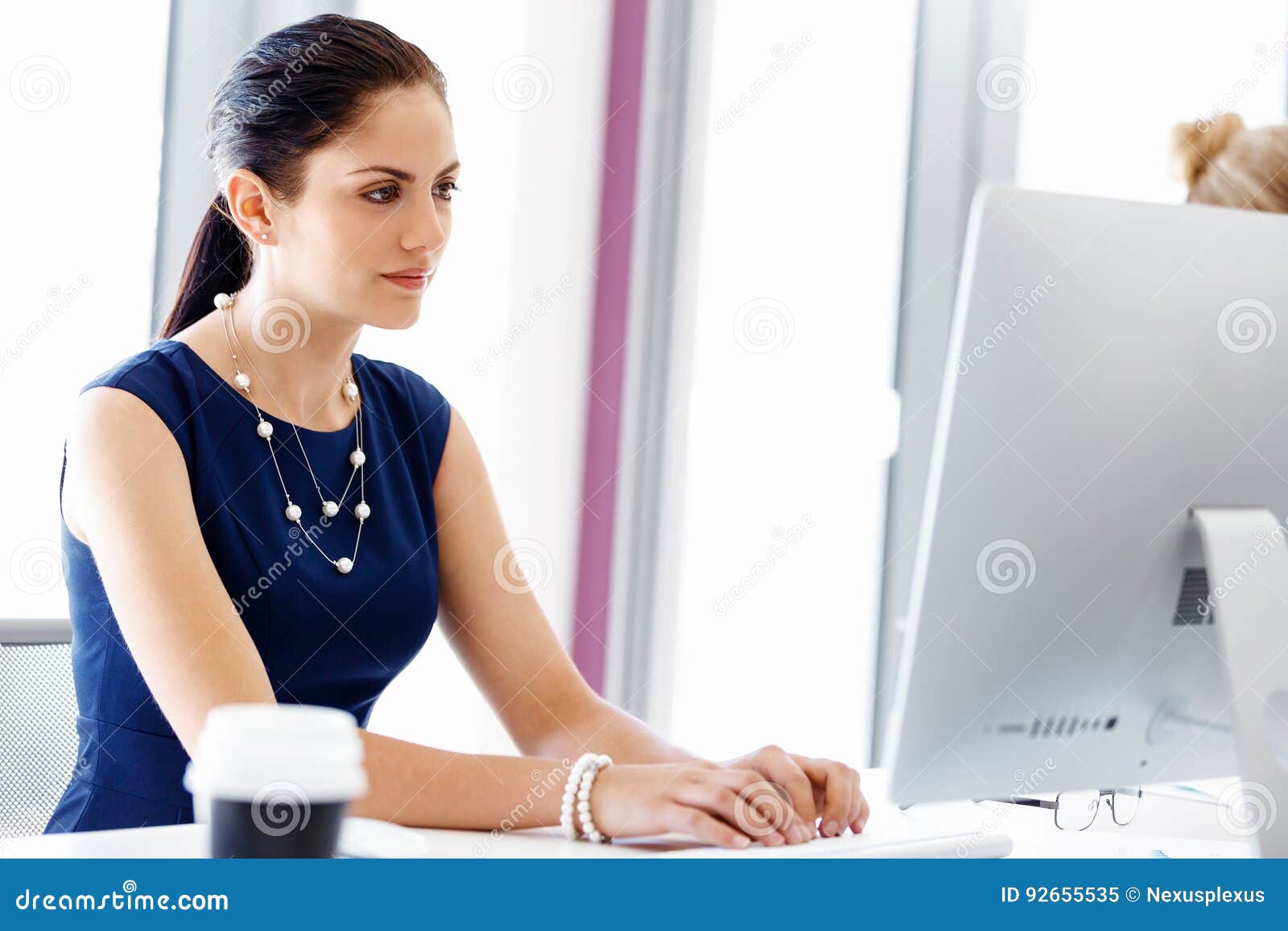 Attractive Office Worker Sitting at Desk Stock Image - Image of beauty ...