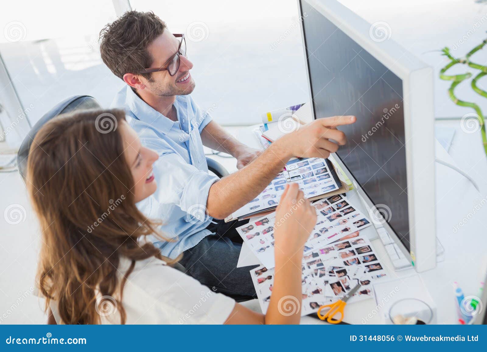 Attractive Photo Editors Working on Computer Stock Photo - Image of ...