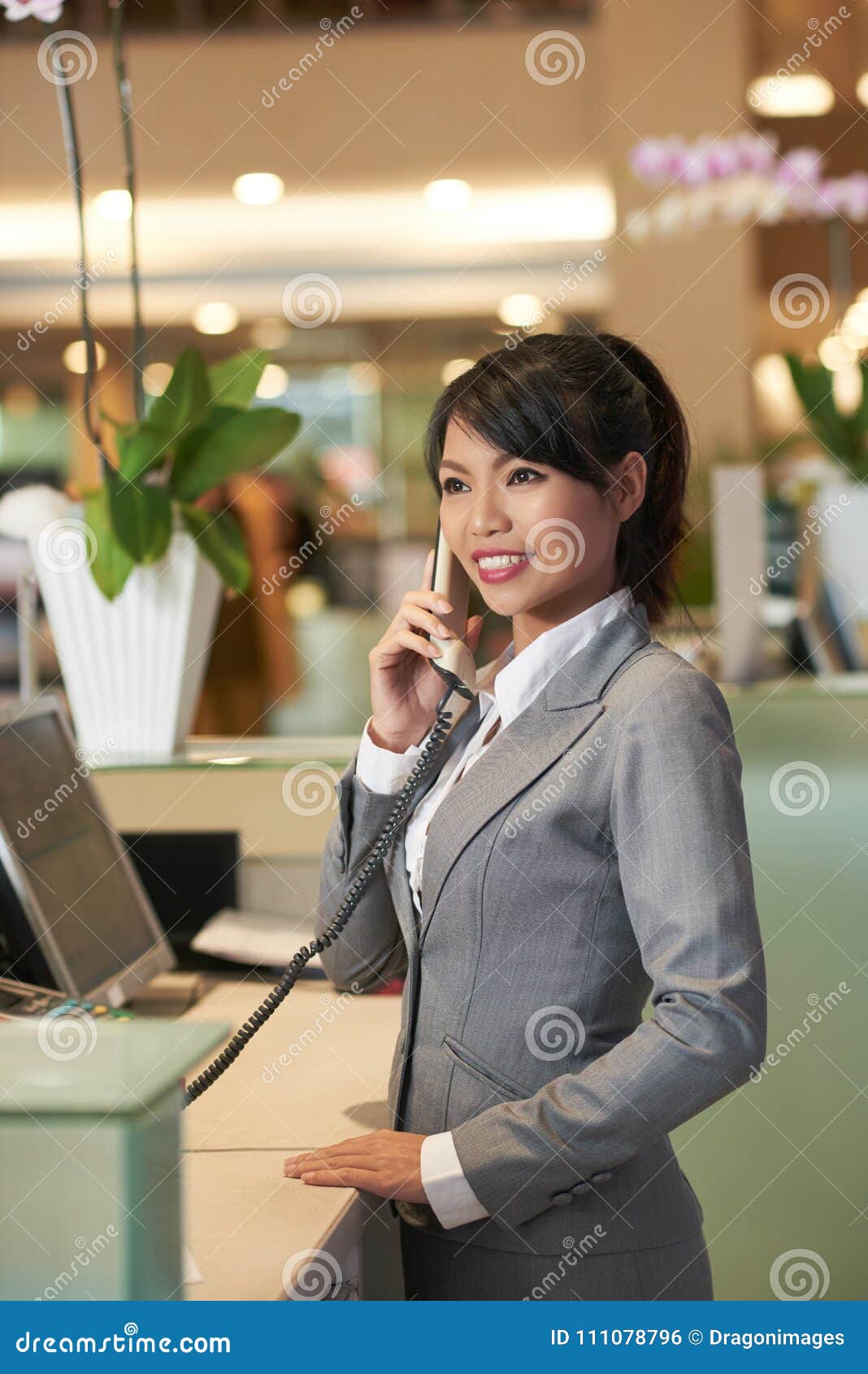 Attractive receptionist stock photo. Image of female - 111078796
