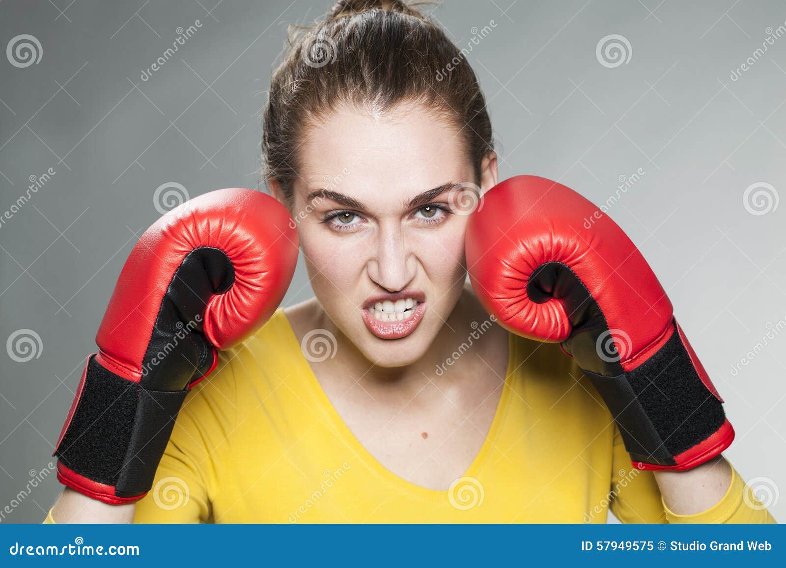 Attractive 20s Woman Threatening To Fight For Success Or Revenge Stock