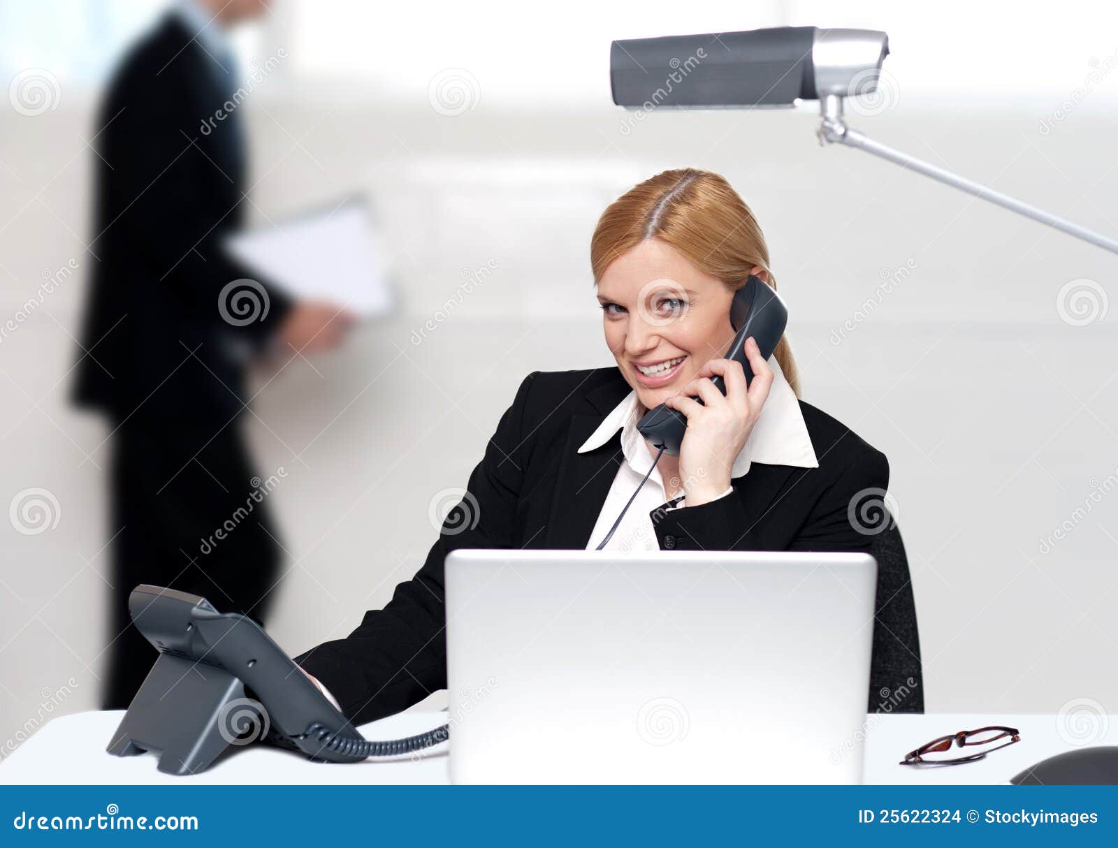 Attractive Secretary Attending Phone Call Stock Photo - Image of ...