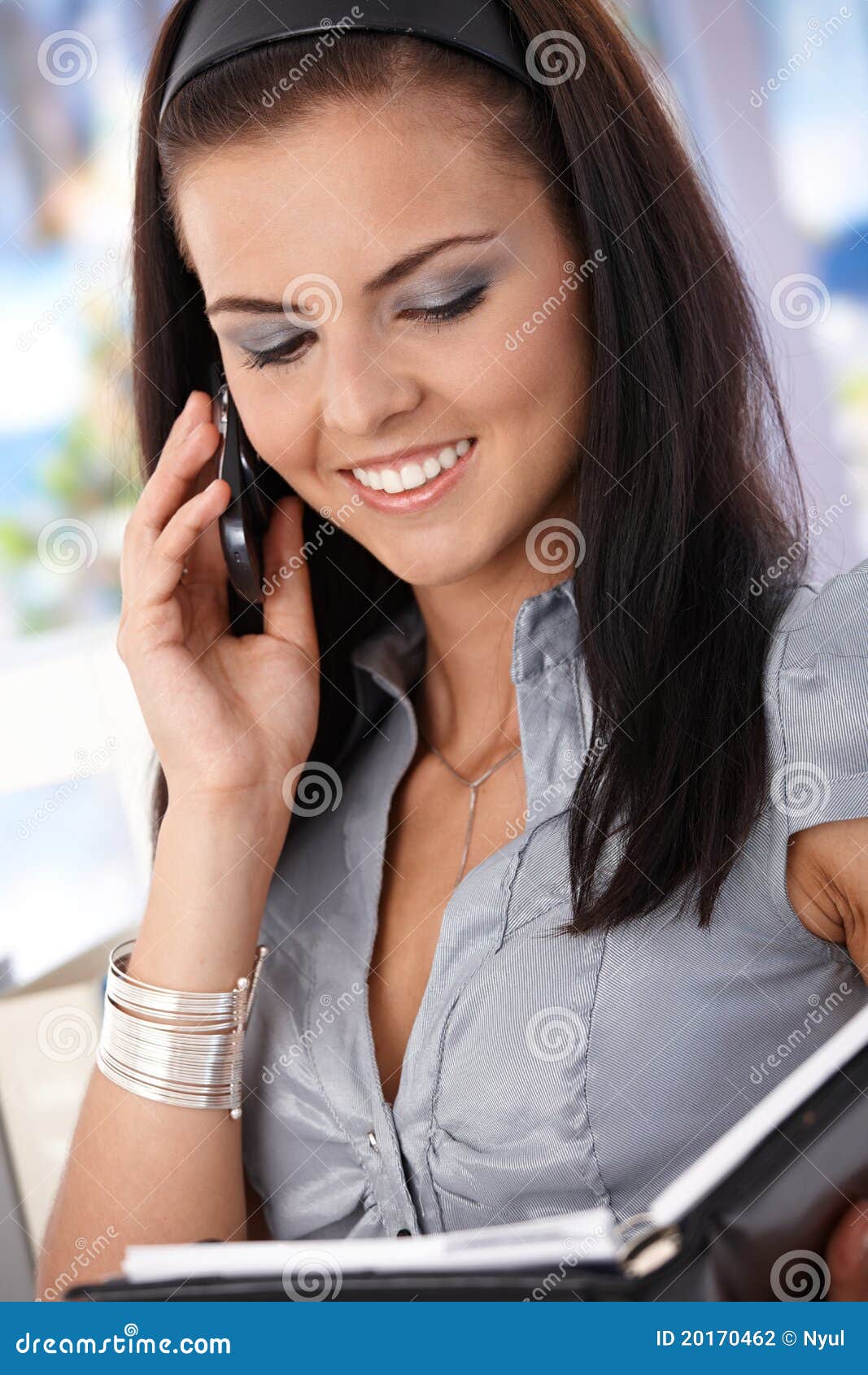 Attractive Secretary on Mobile Smiling Stock Photo - Image of files ...