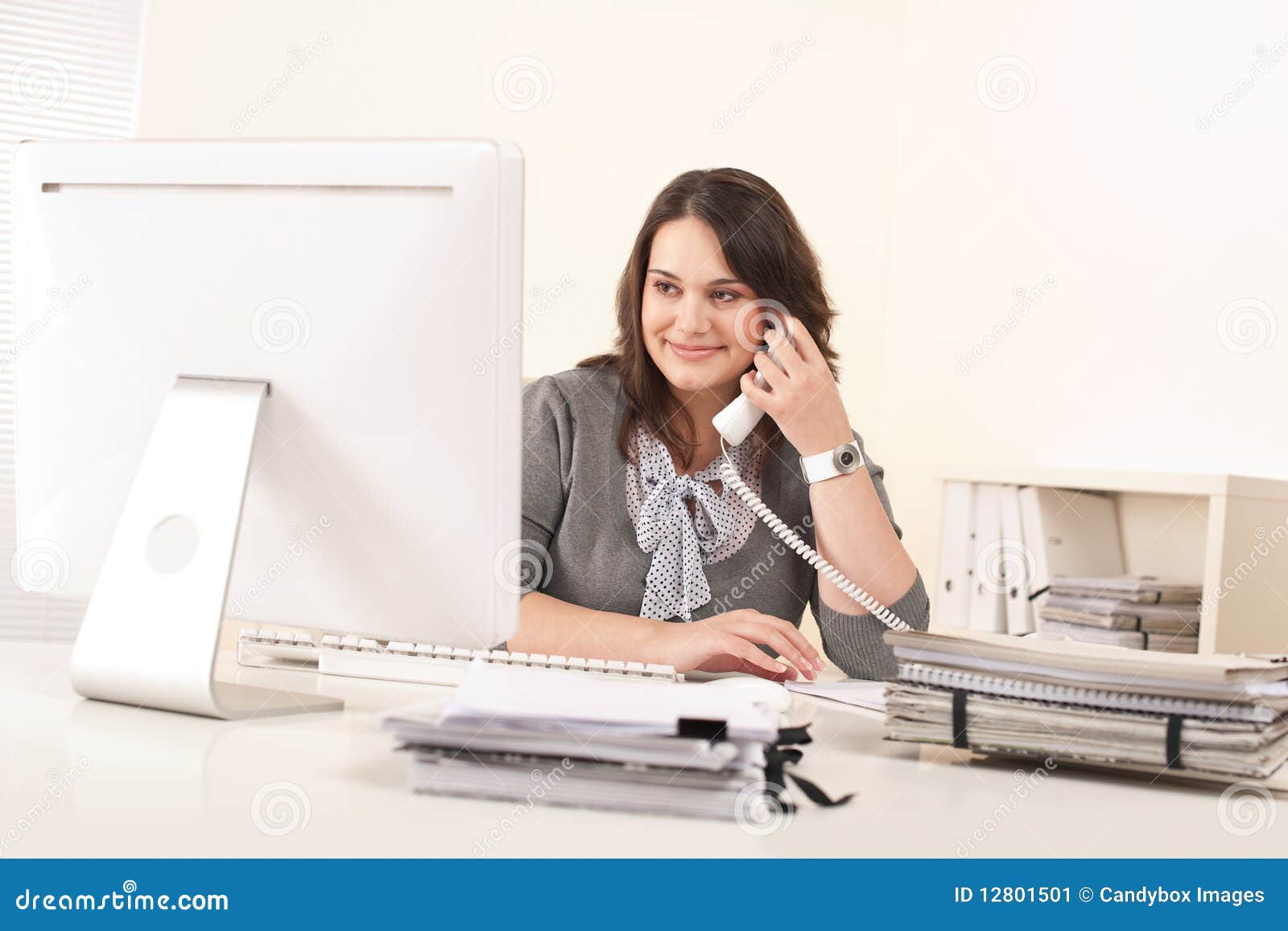 Attractive Secretary on Phone at Office Stock Image - Image of ...