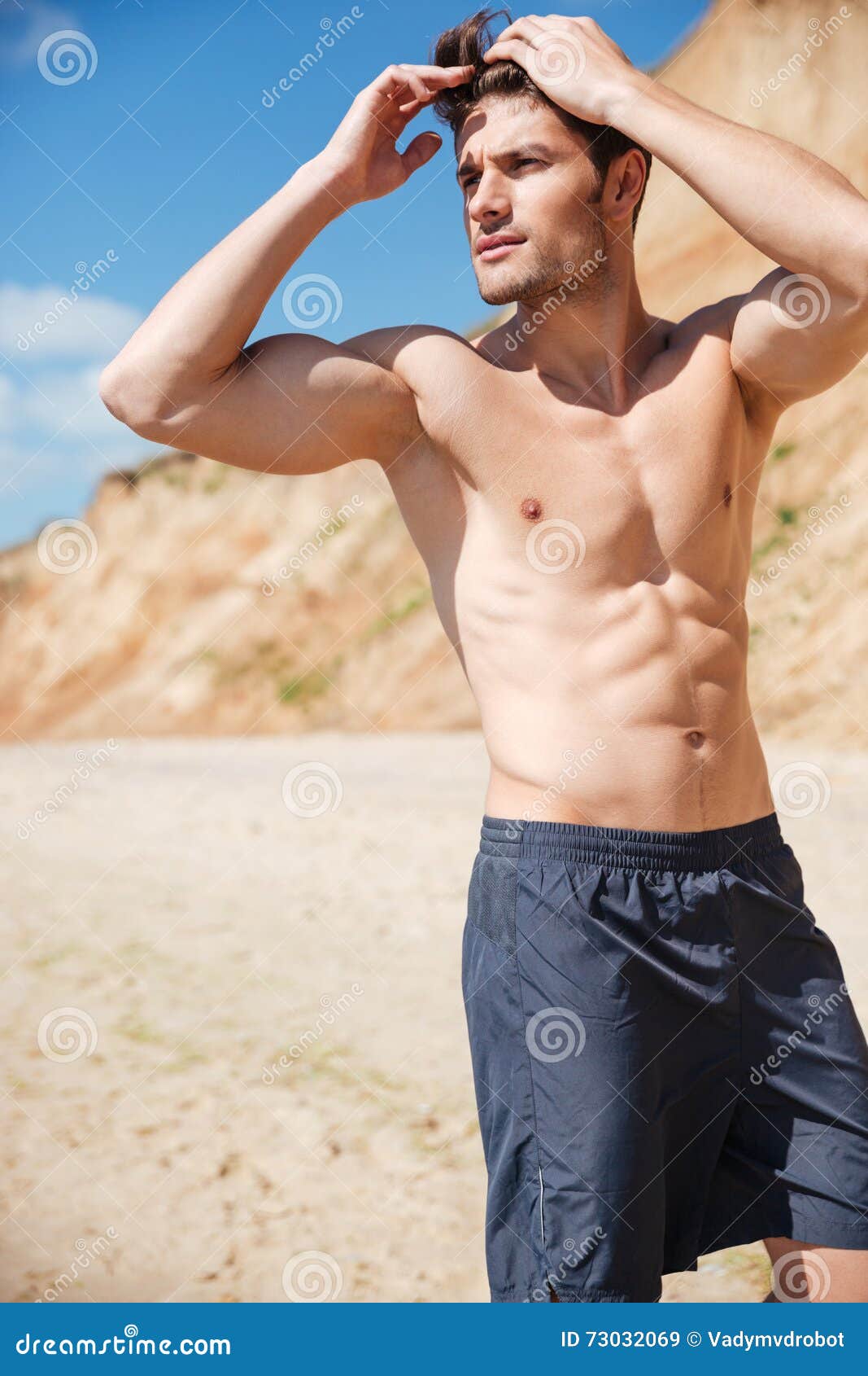 Attractive Shirtless Young Man Standing on Beach Stock Image - Image of ...