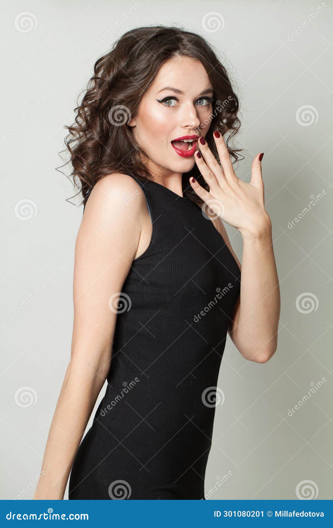 Attractive Shocked Surprised Brunette Woman With Make Up Curly Brown