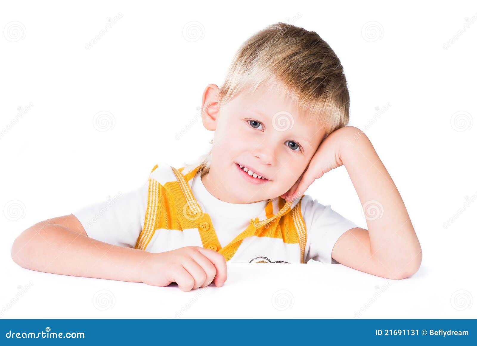 Attractive Smiling Boy Sitting at Table Isolated Stock Image - Image of ...