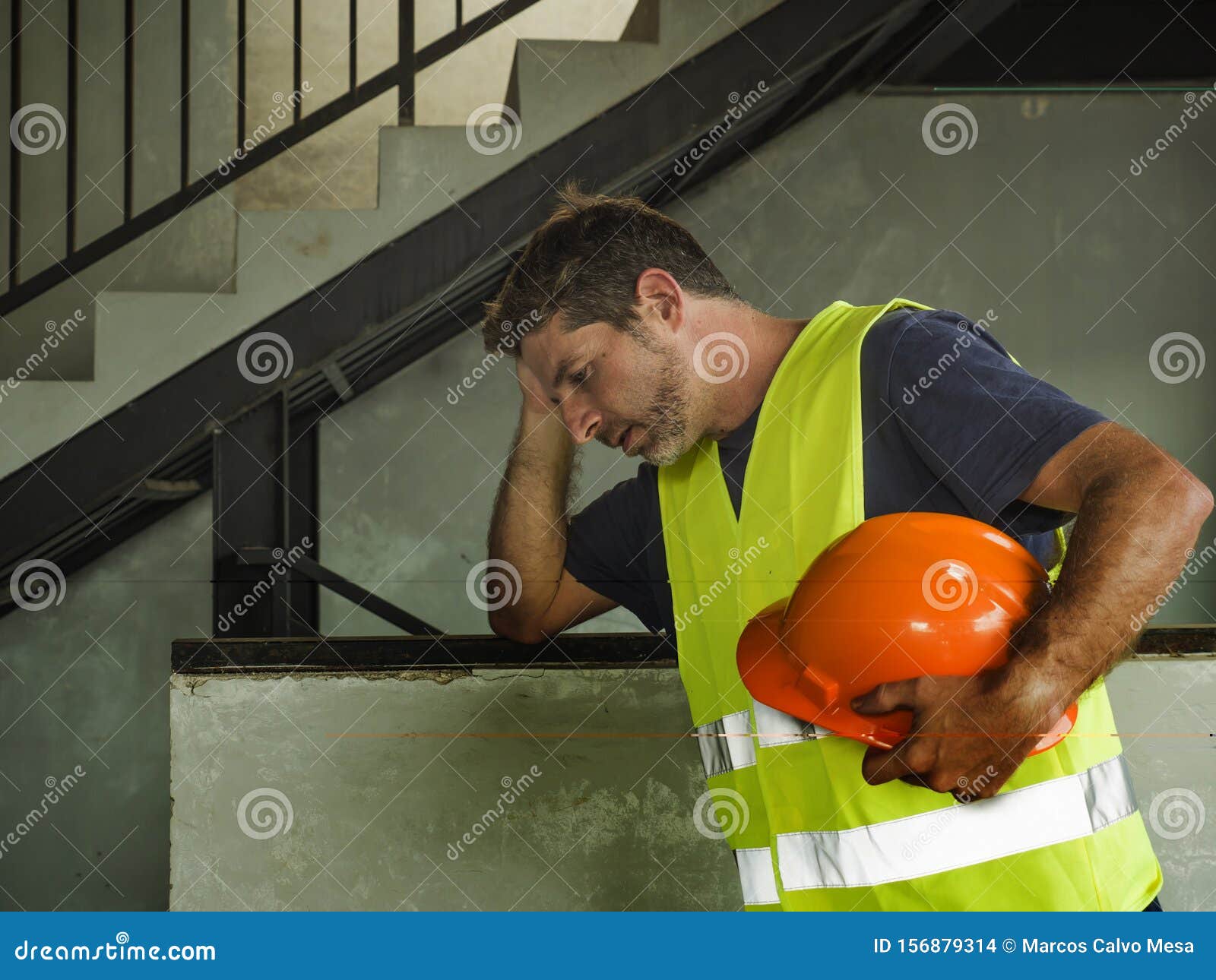 . Attractive Stressed and Frustrated Construction Worker Man in Vest ...