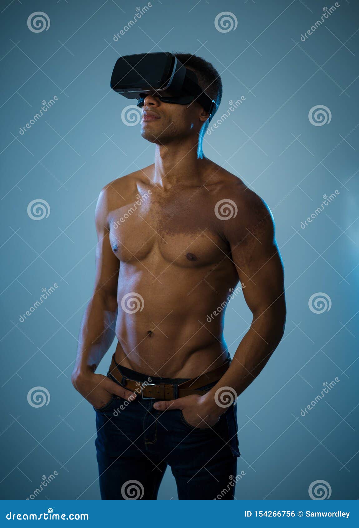 Strong Young Man Wearing Virtual Reality Headset Exploring 3D ...