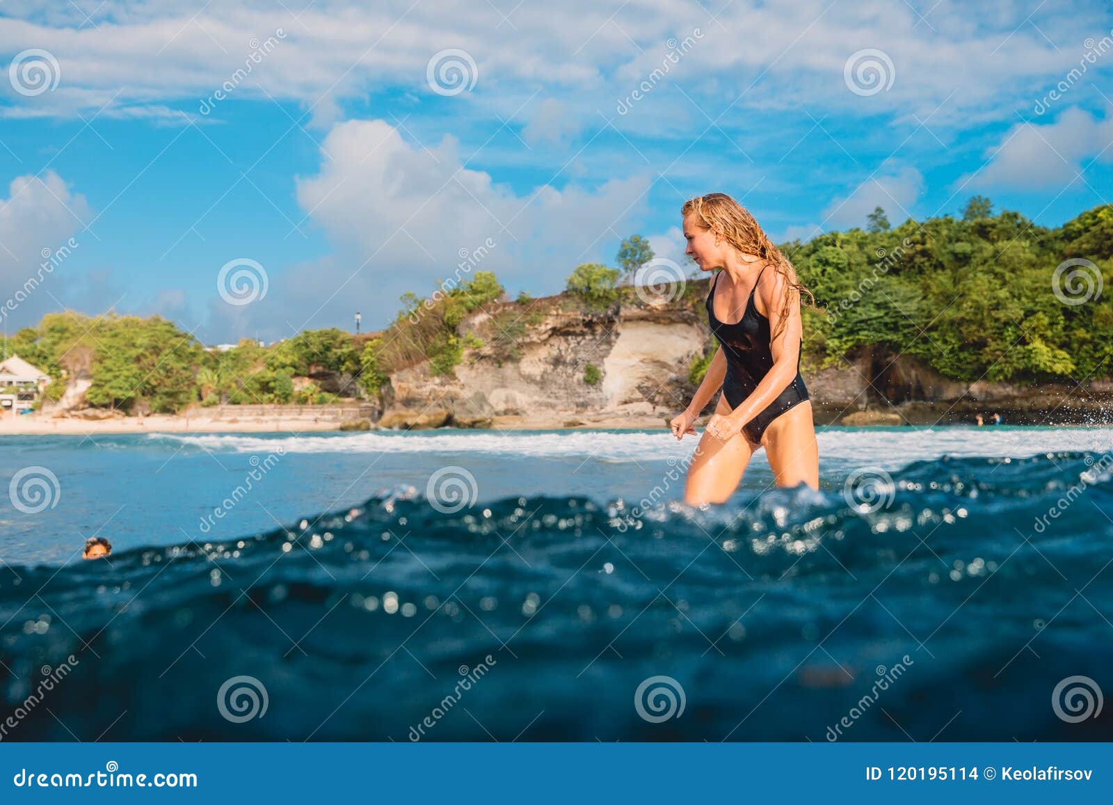 Attractive Surf Girl On Surfboard Woman In Ocean During Surfing