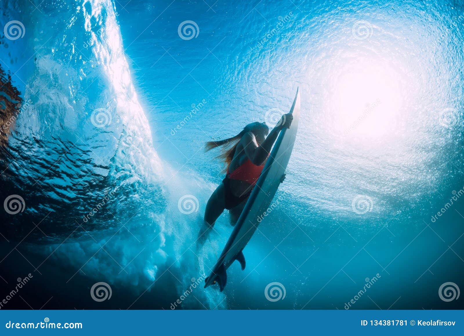 Attractive Surfer Woman Dive Underwater with Under Barrel Wave Stock ...