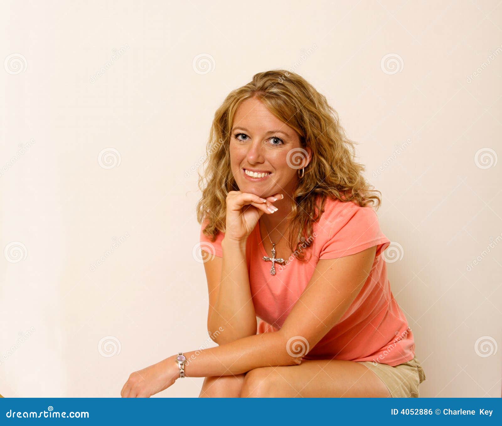 Attractive, Tanned Lady stock photo. Image of peach, blond - 4052886