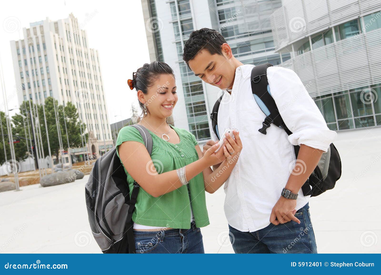 Attractive Teenage Students at College Stock Image - Image of couple ...