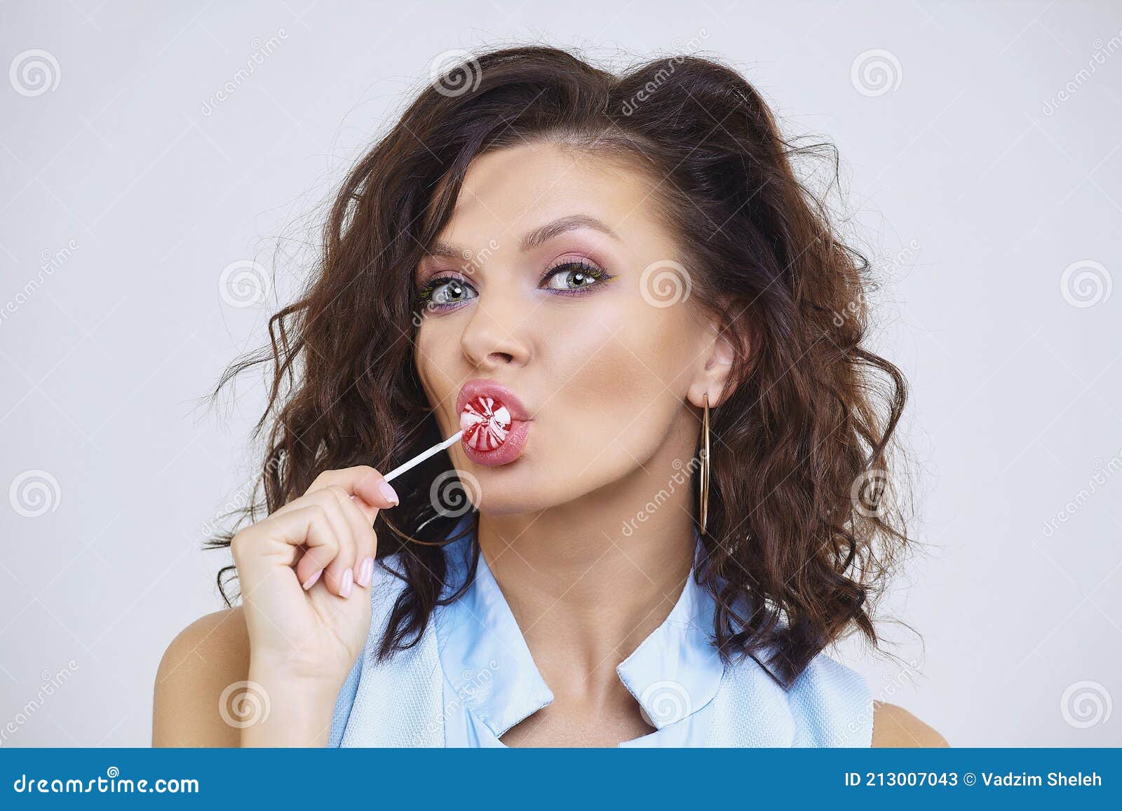 Attractive Thoughtful Girl Sucks A Lollipop Stock Image Image Of