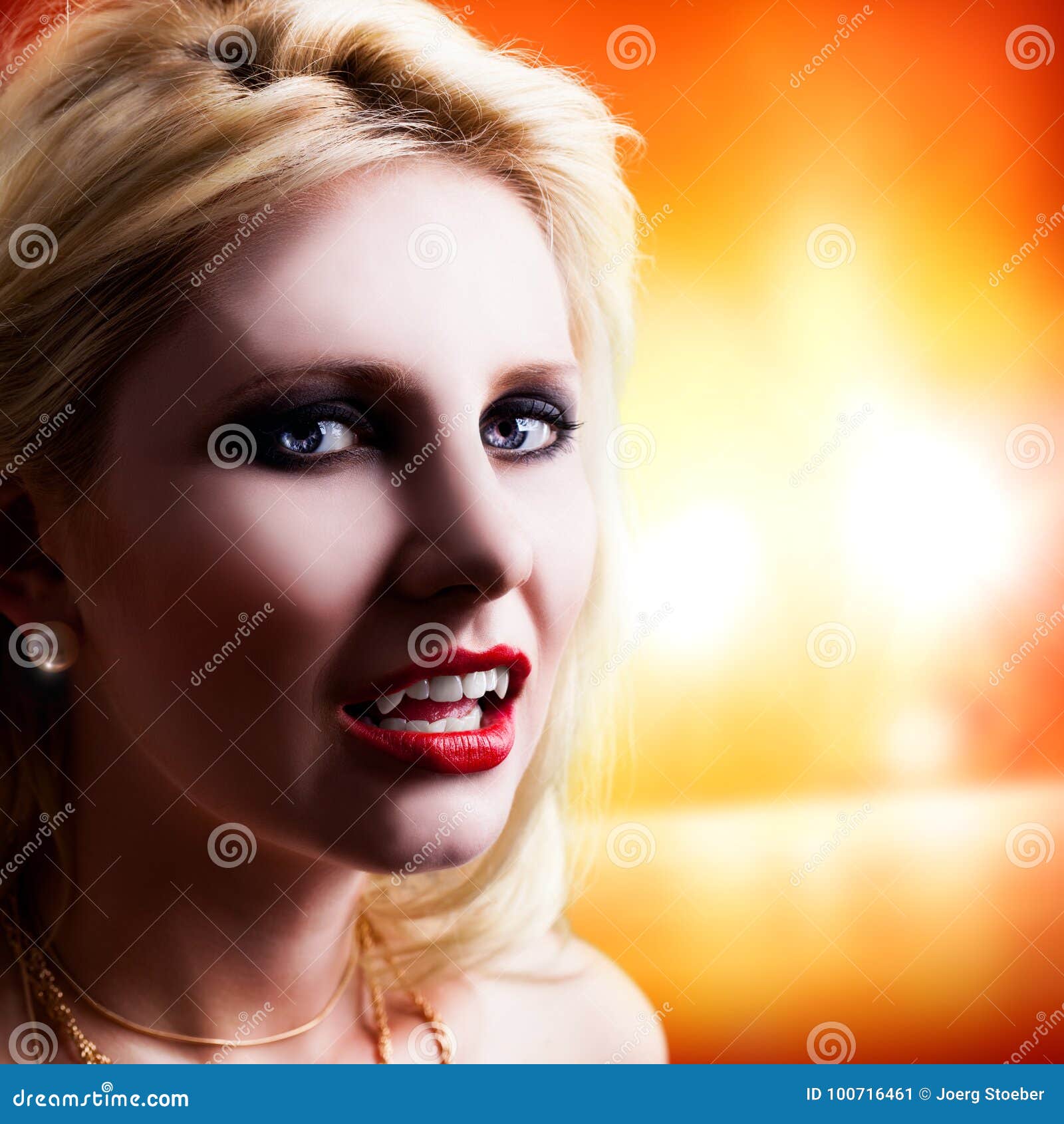 Attractive Vampire in Front of Light Background Stock Image - Image of ...