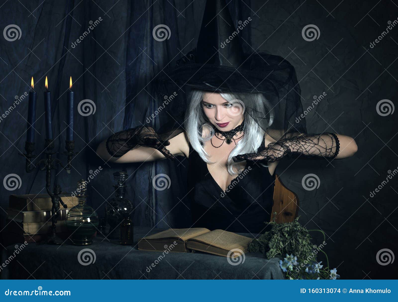 Witch at work stock photo. Image of magic, book, dress - 160313074