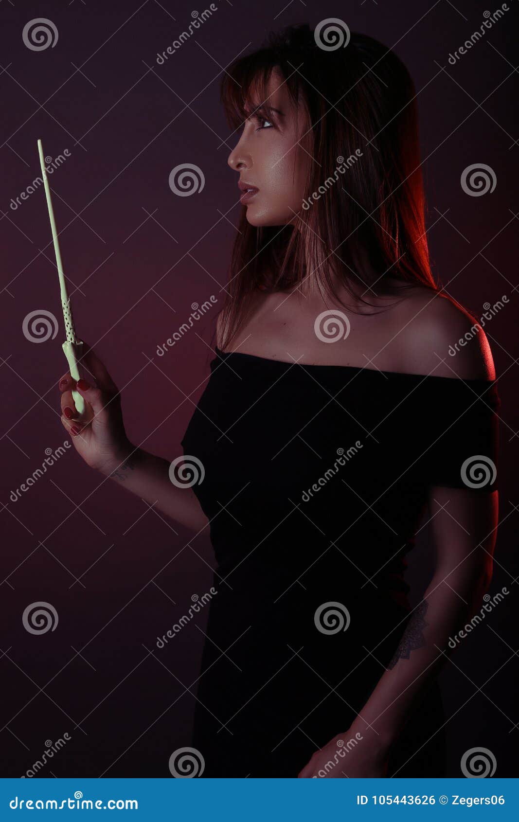 Attractive Witch Holding a Magic Wand Stock Photo - Image of woman ...