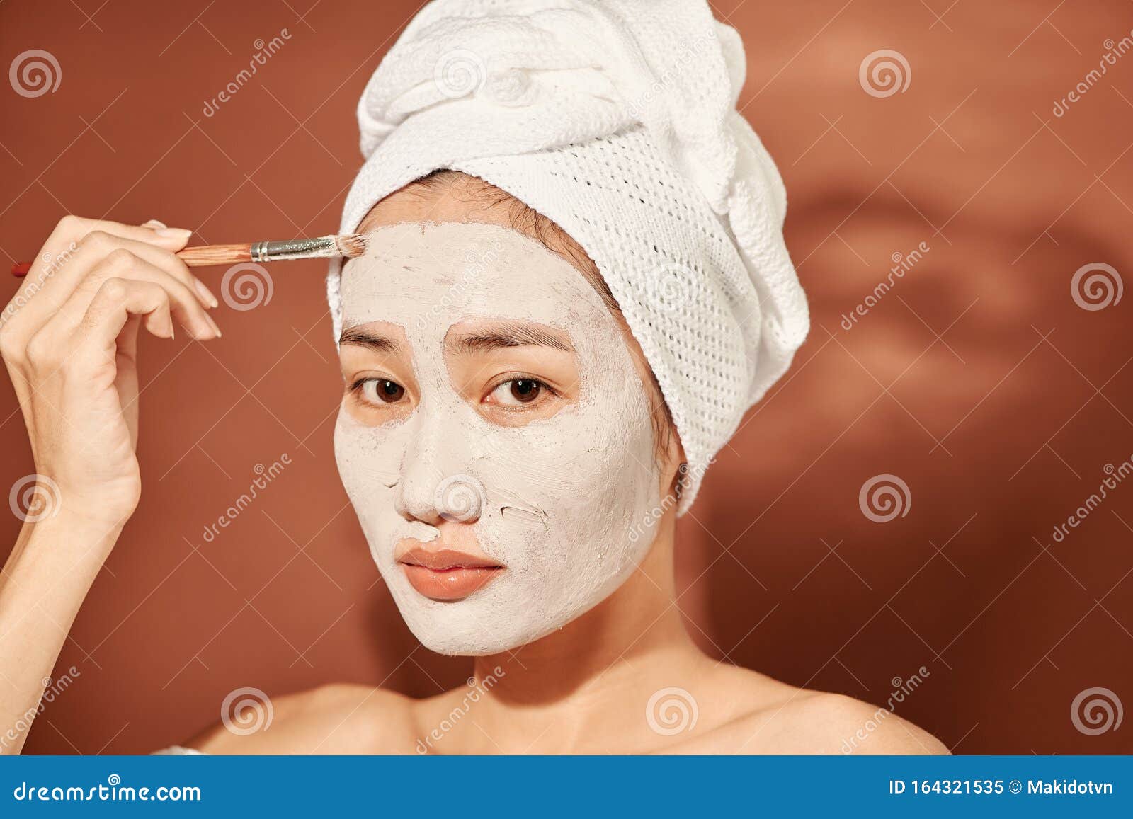 Attractive Woman Applying Clay Mask On Her Face Stock Image Image Of