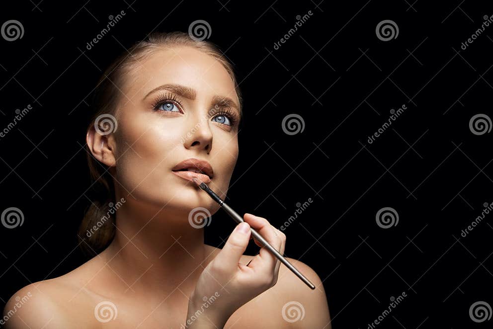 Attractive Woman Applying Lip Gloss Stock Image Image Of Copy