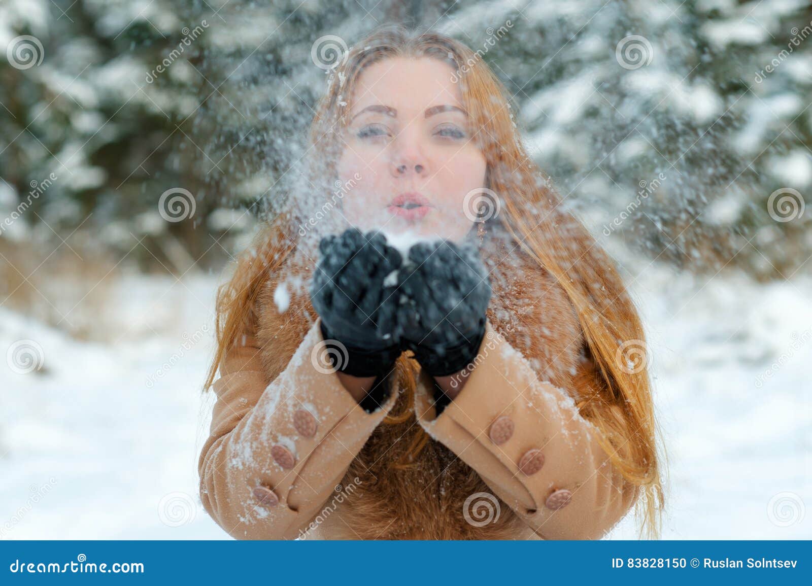 Attractive Woman Blowing Snow in Hands Stock Photo - Image of ...