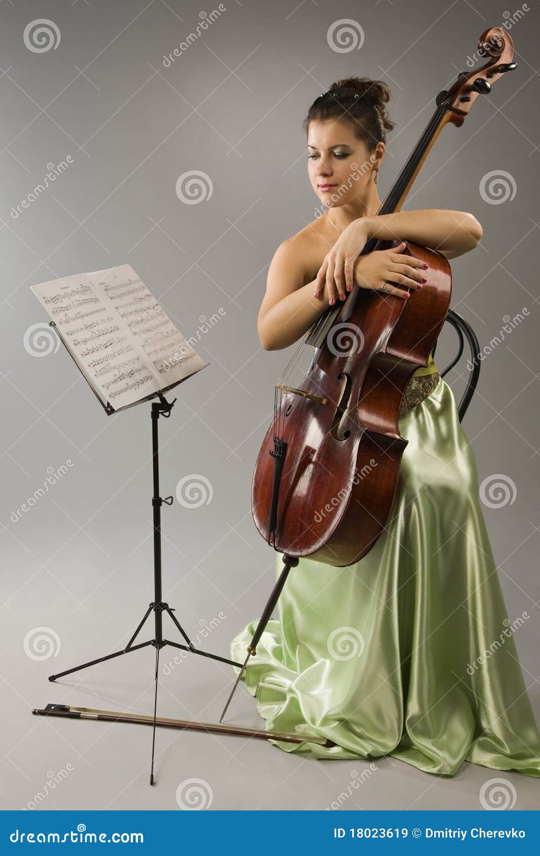 Attractive Woman With Cello Stock Image - Image: 18023619