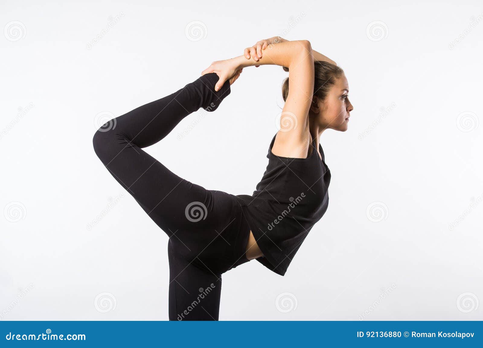 Attractive Woman Doing Standing Bow Yoga Pose Stock Photo - Image of ...