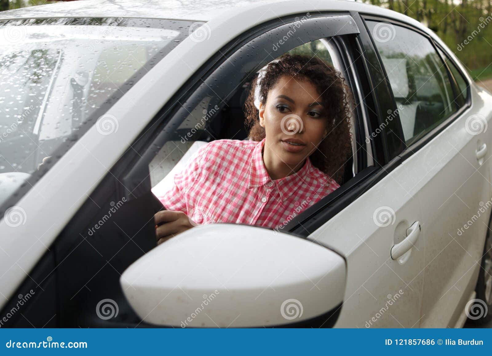 Attractive Woman Driver Looking Back and Parking Car Stock Photo ...