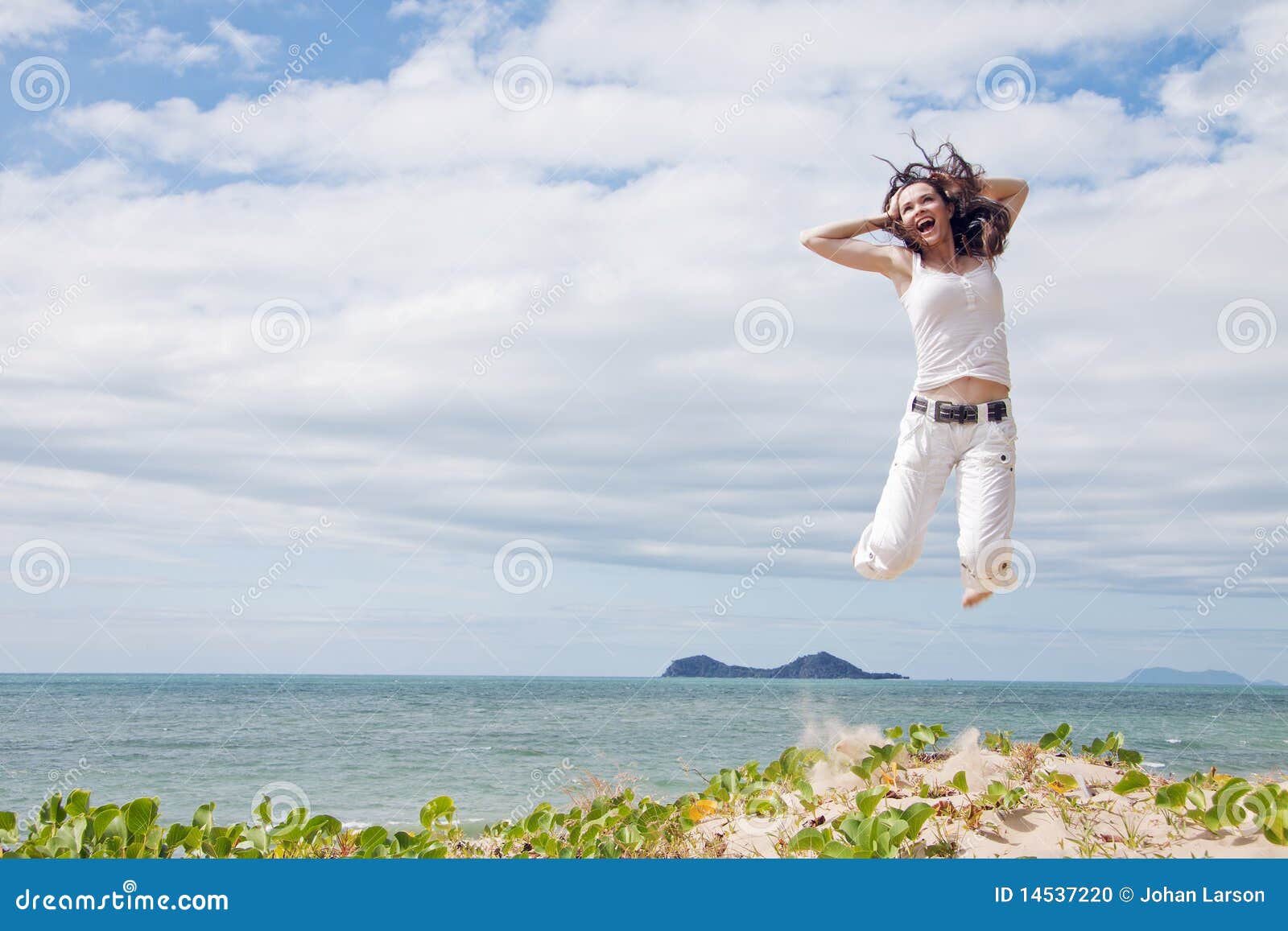 Attractive Woman Jumping of Joy on Tropical Beach Stock Photo - Image ...