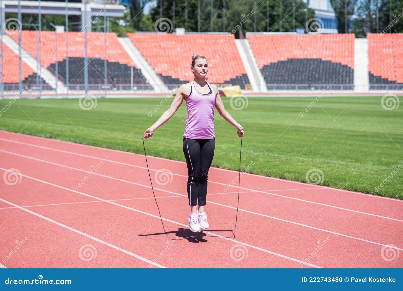 Attractive Woman Jumping Rope at Stadium. Stock Photo - Image of ...