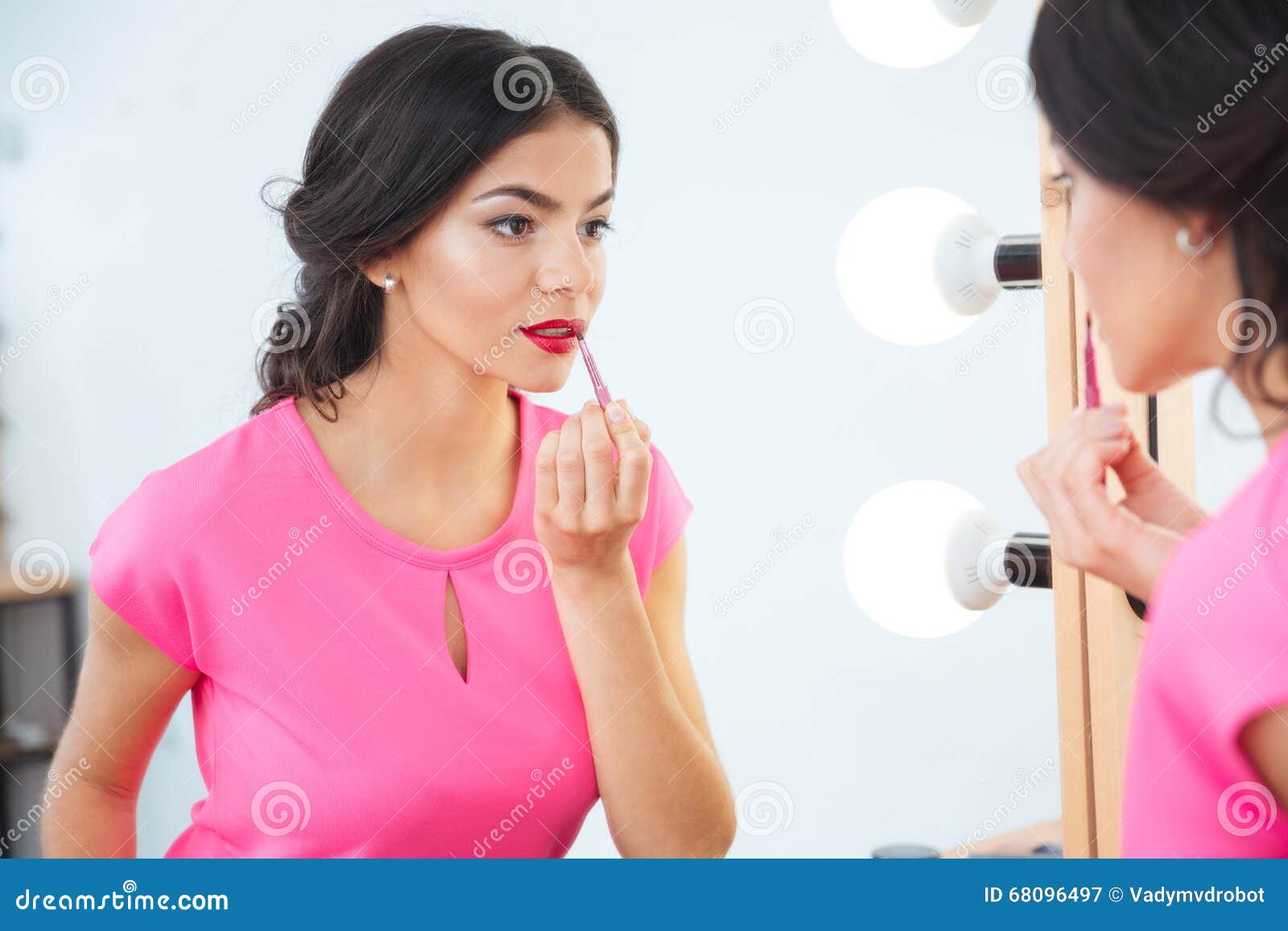 Attractive Woman Looking At Mirror And Applying Red Lipstick Tolips Stock Image Image Of Face