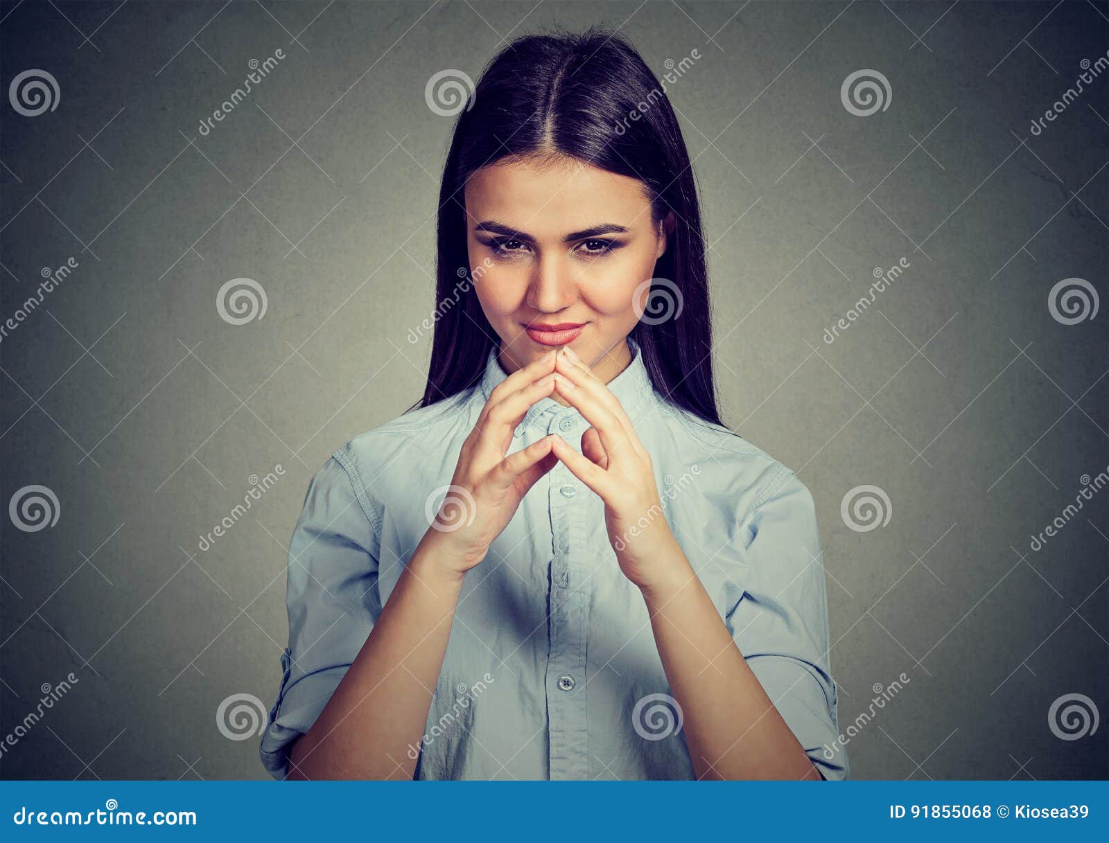 Attractive Woman Looking with Sly Expression, Having Good Idea Stock ...