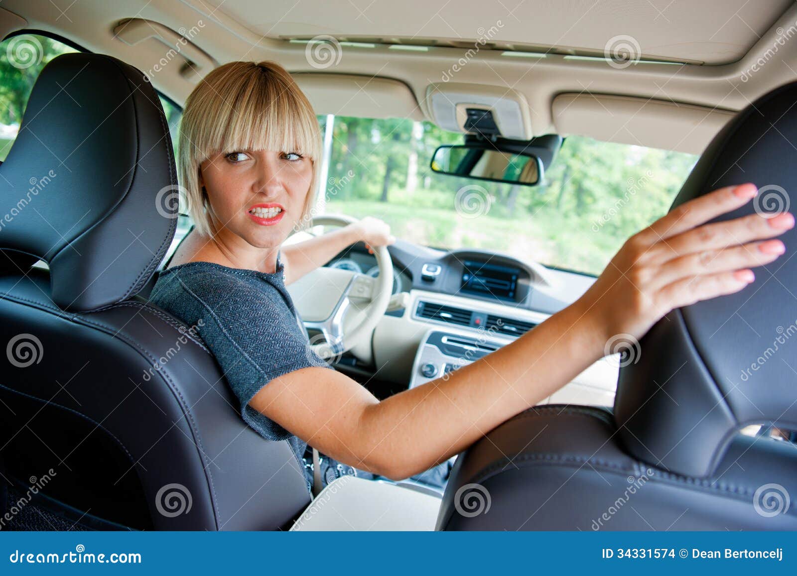 Attractive Woman Parking Her Car Stock Photo - Image of pretty, human ...