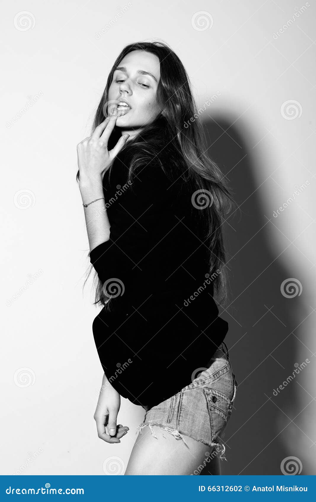 Attractive Woman Posing by the Wall. Stock Photo - Image of person ...