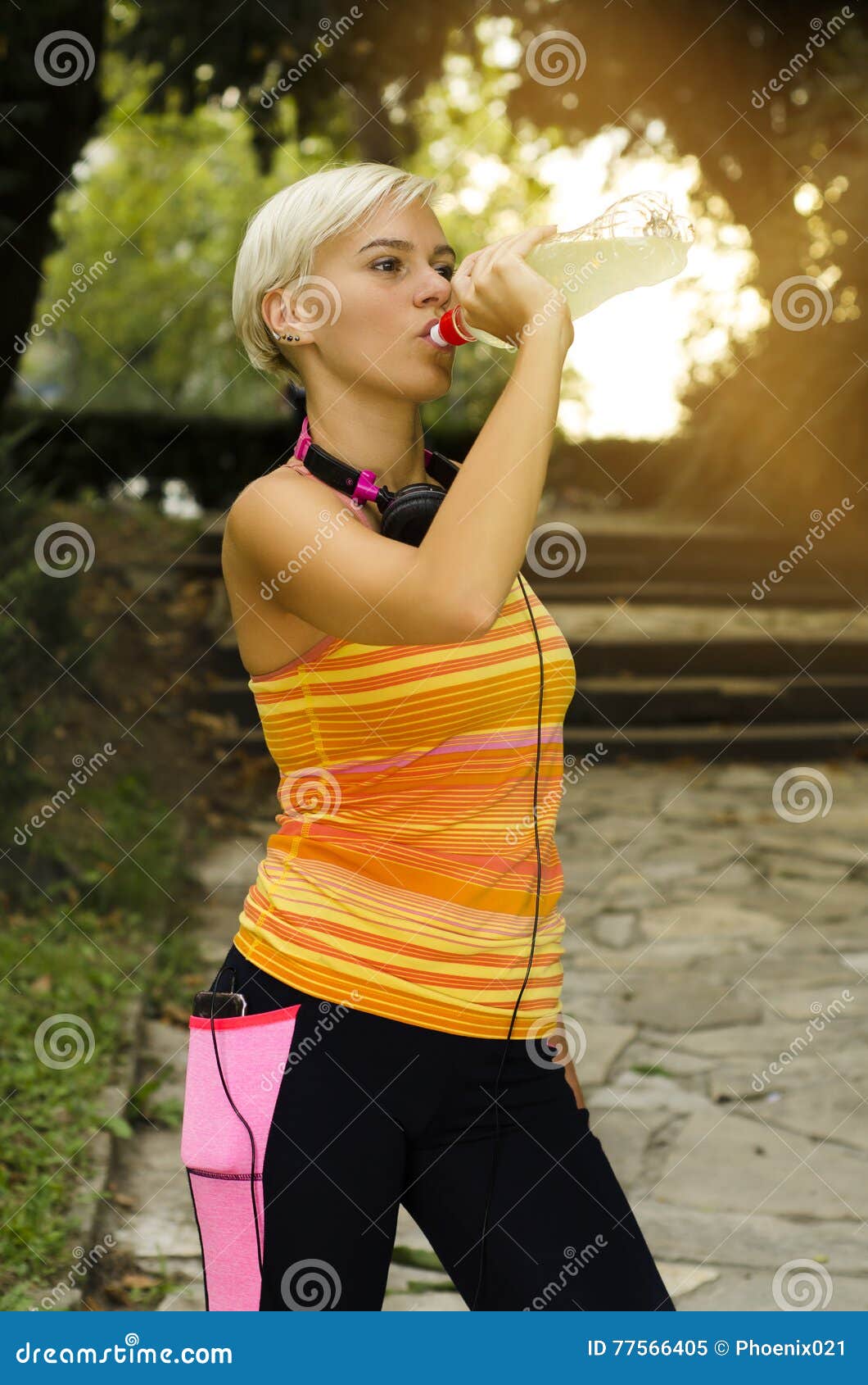 Attractive Woman Runner Drinking Refreshing Drink Stock Image - Image ...
