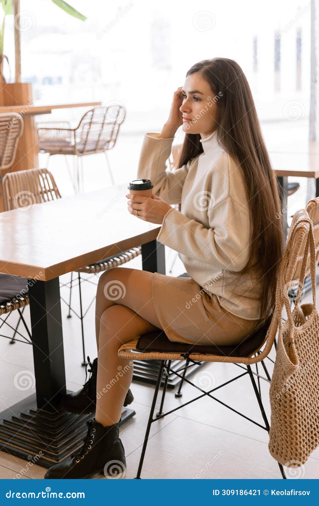 Attractive Woman Sitting in Cafe and Drinking Coffee Stock Image ...
