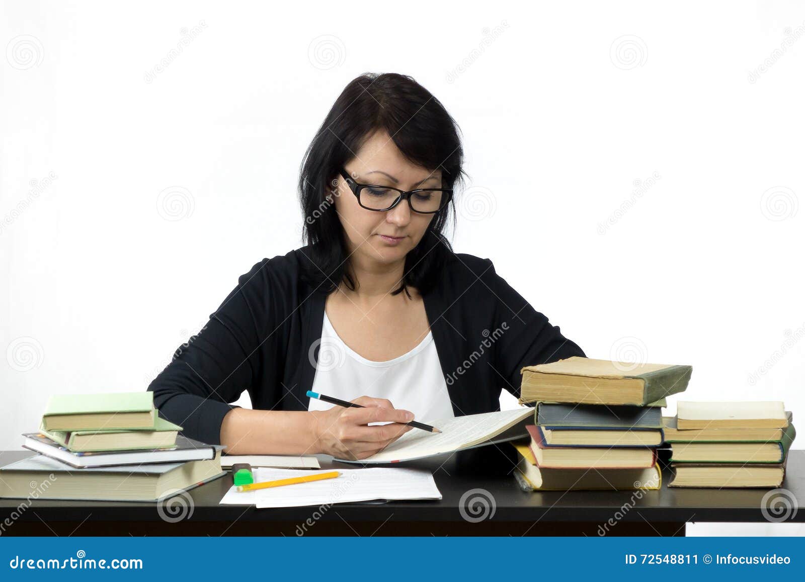 Attractive Woman Sitting at Table Studying Stock Image - Image of ...