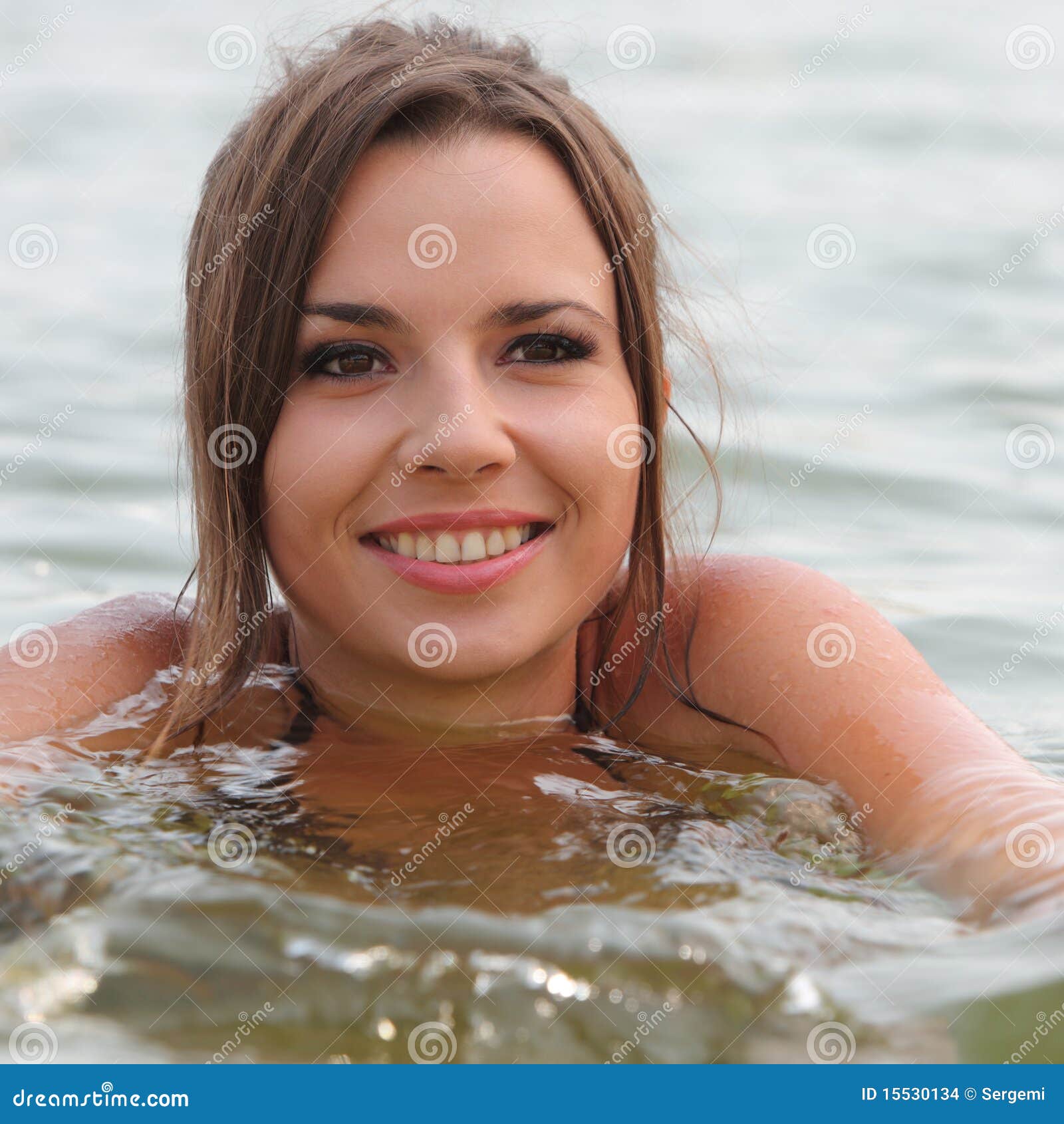 Attractive woman swim stock photo. Image of people, sand - 15530134