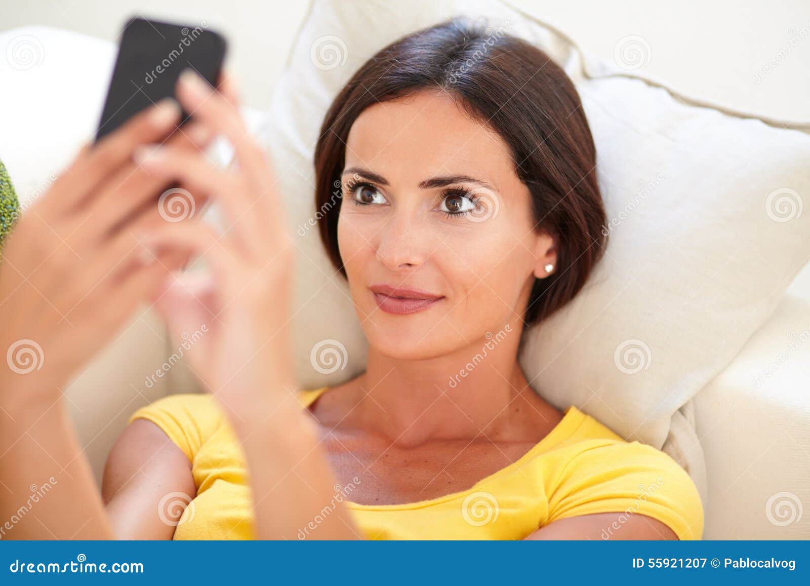 Attractive Woman Using a Cell Phone Stock Image - Image of peaceful ...