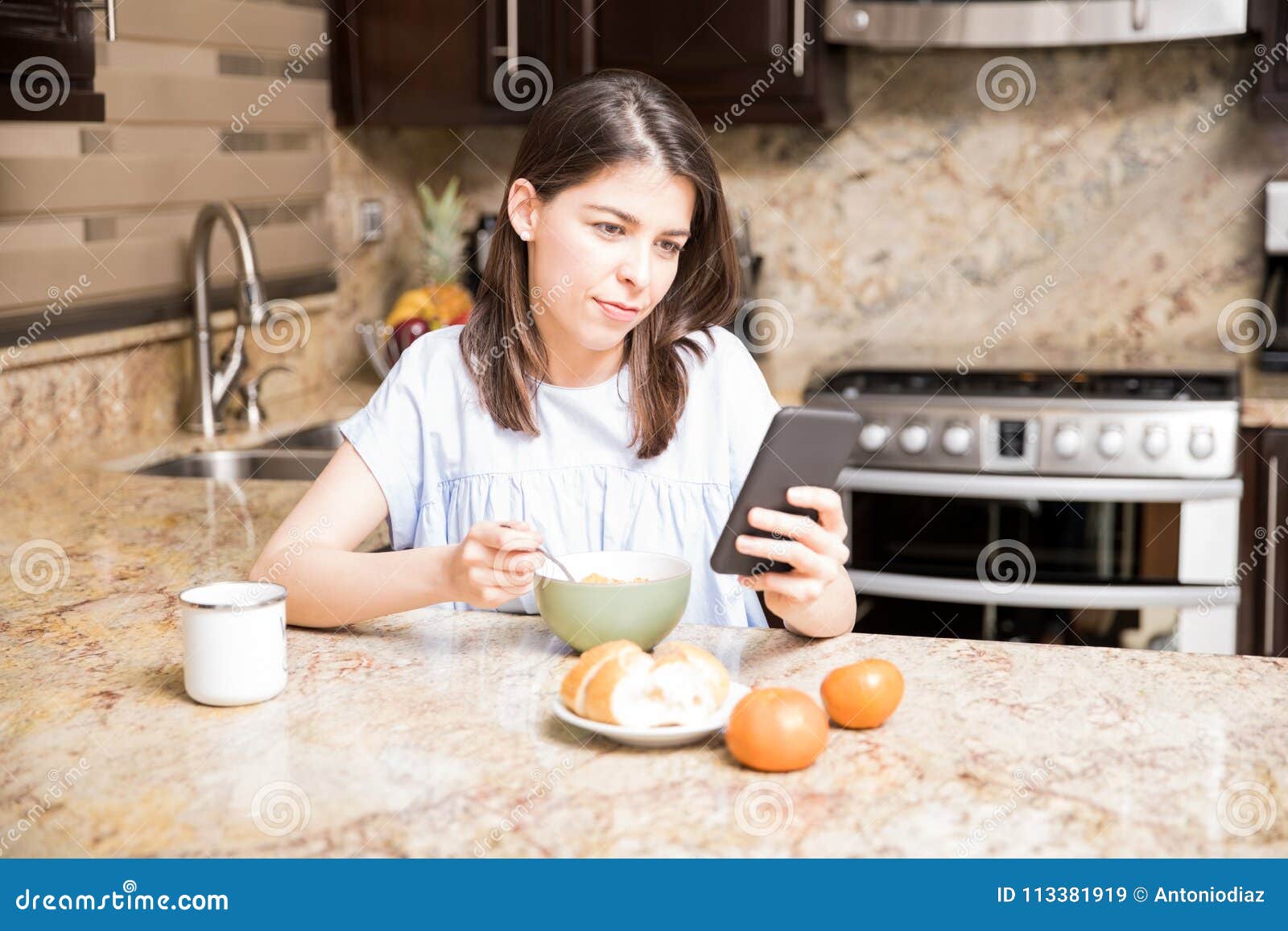 Attractive Woman Using Phone Over Breakfast at Home Stock Image - Image ...