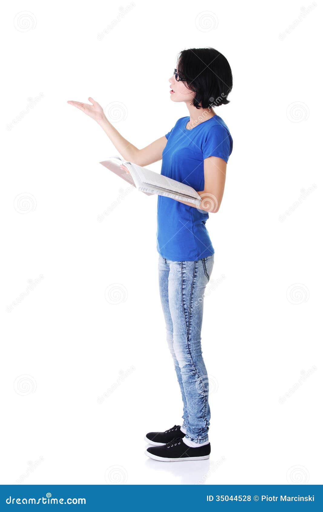 Attractive Woman with Workbook. Side View. Pointing on Copy Space Stock ...