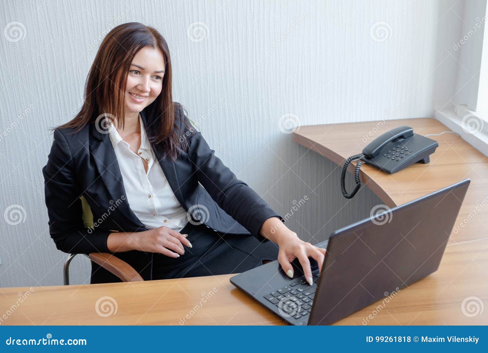 Attractive Woman Working in Office on Laptop Stock Photo - Image of ...