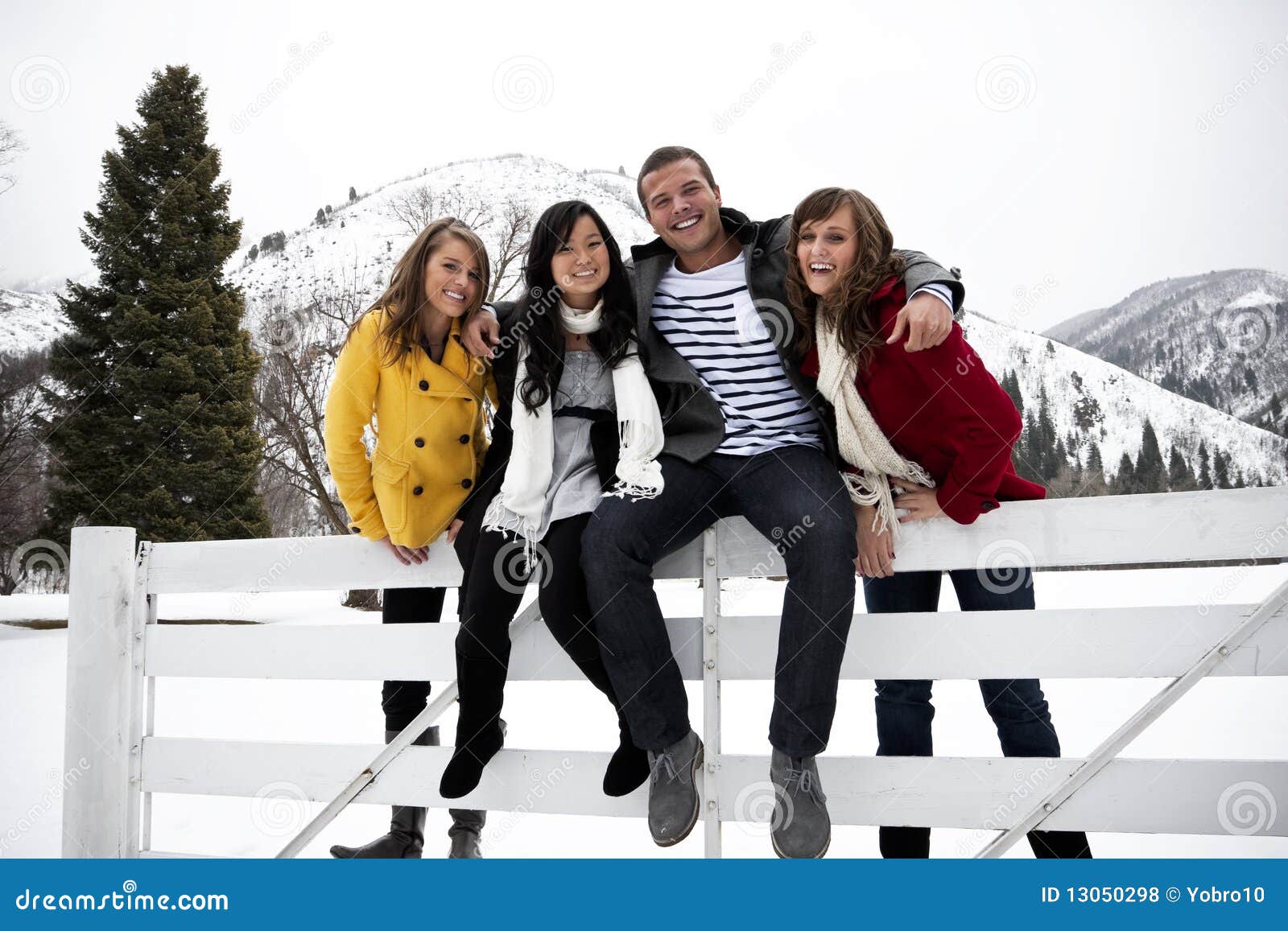 Attractive Young Adults in Winter Stock Photo - Image of fence, active ...