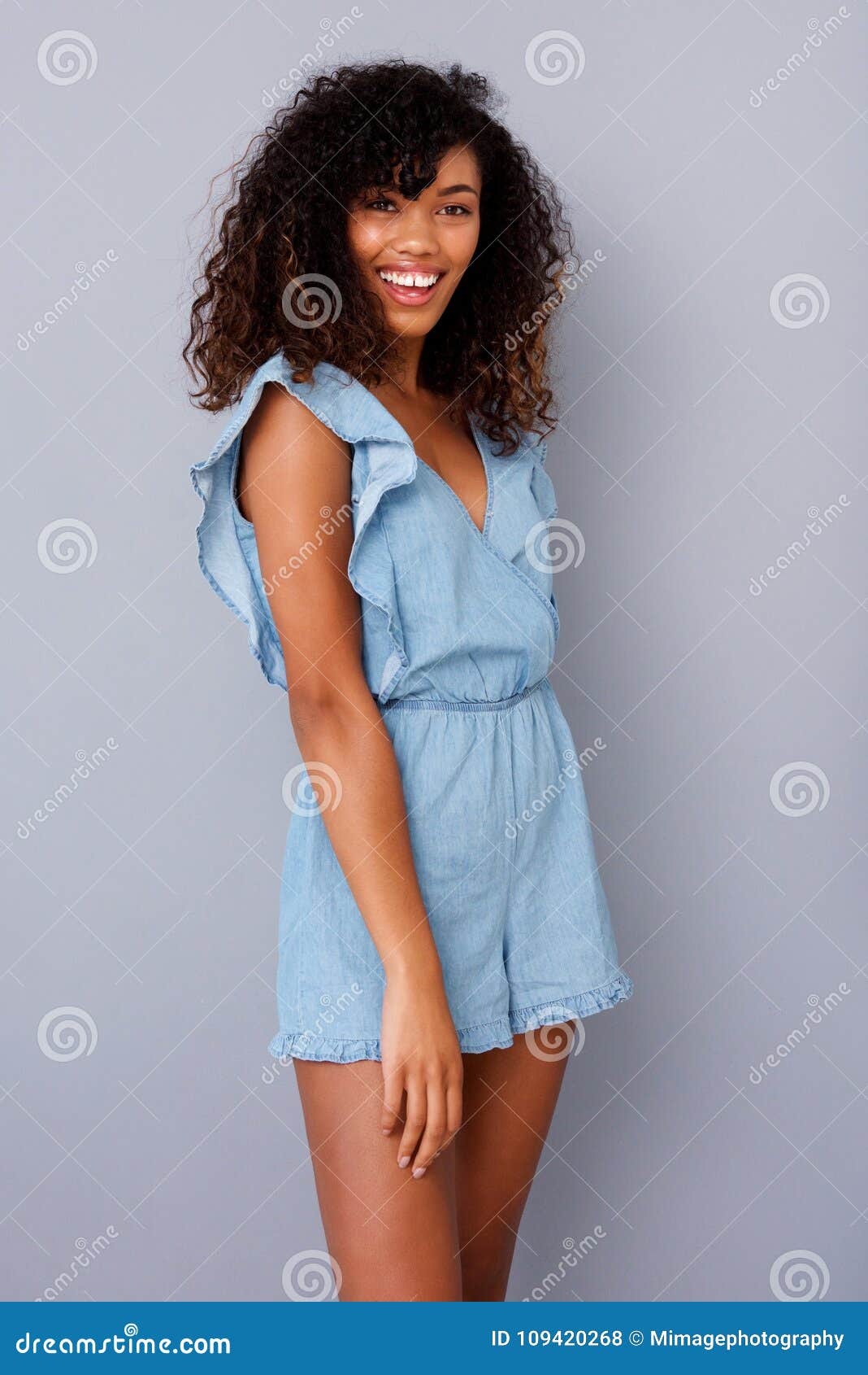 Attractive Young Black Woman Smiling Against Gray Background Stock ... Attractive Young Black Woman Smiling Against Gray Background Stock ...