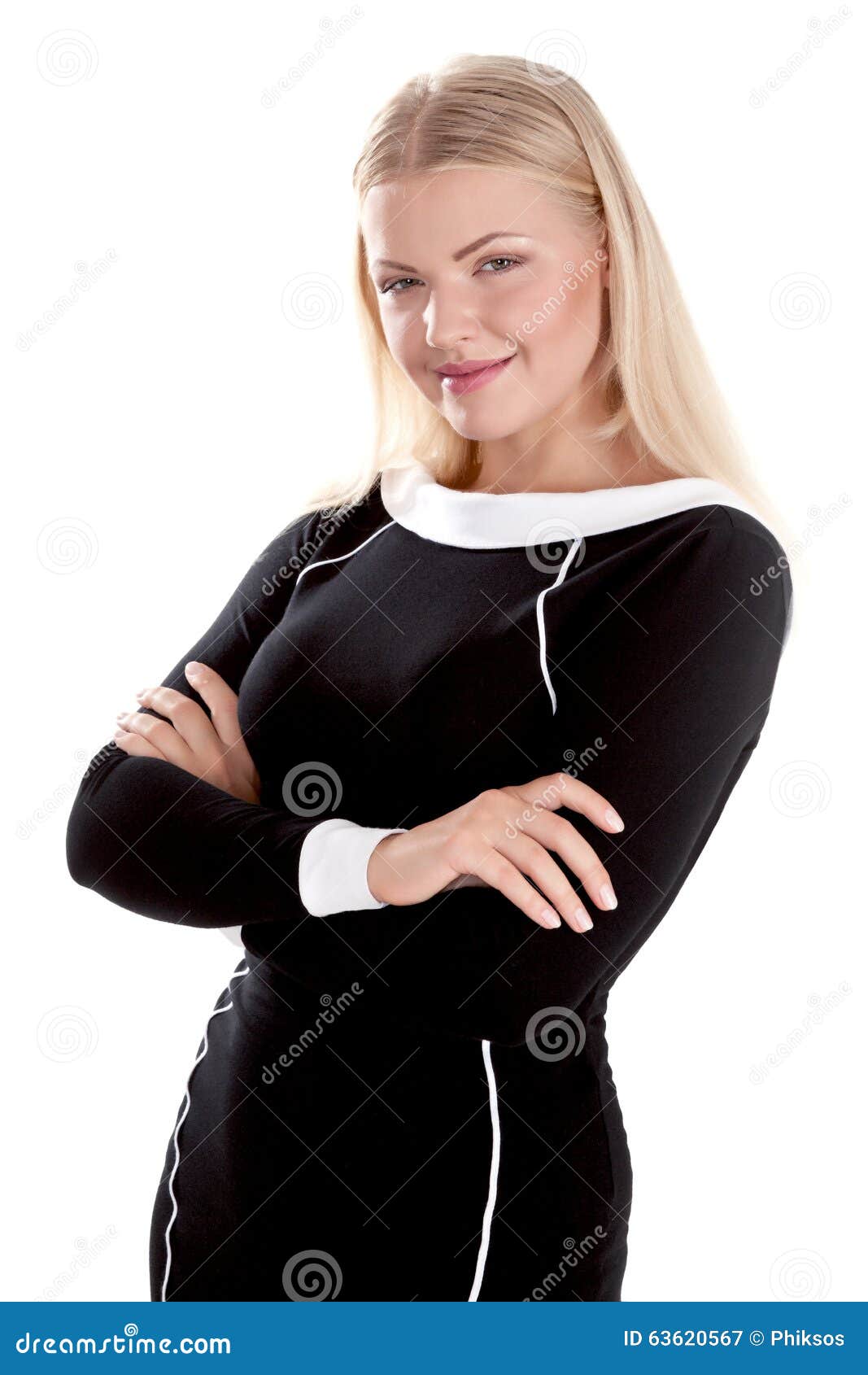 Attractive Young Blond Businesswoman Standing With Her Arms Crossed