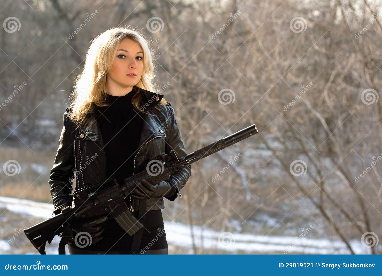 Attractive Young Blonde with a Gun Stock Image - Image of beautiful ...