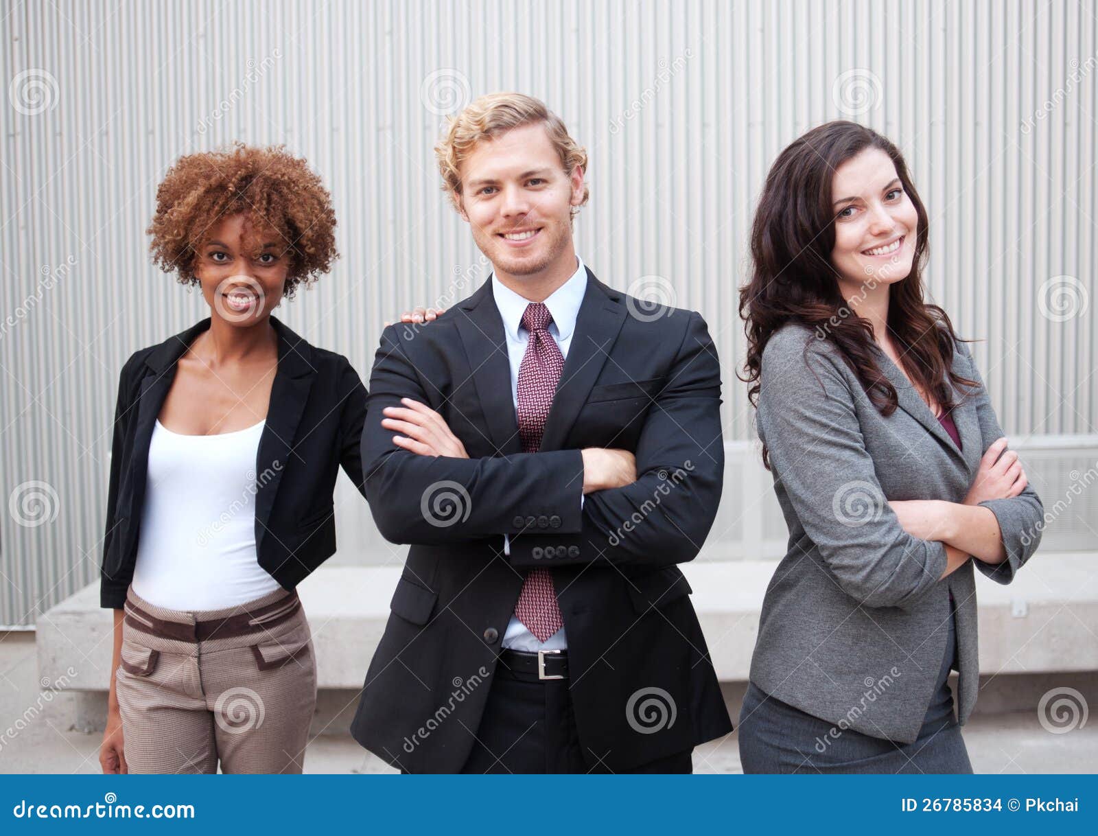 Attractive Young Business Group Standing Together at Office Stock Photo ...