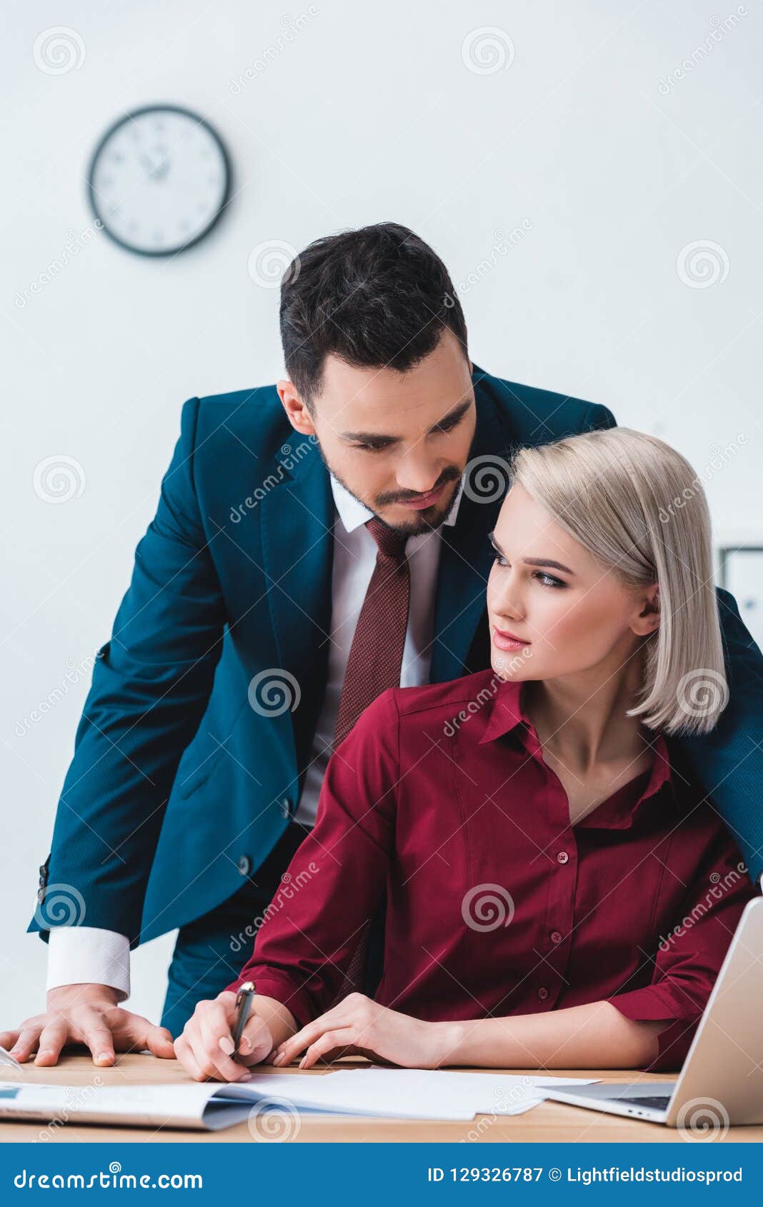 Attractive Young Businessman and Businesswoman Flirting Stock Image ... Attractive Young Businessman and Businesswoman Flirting Stock Image ...