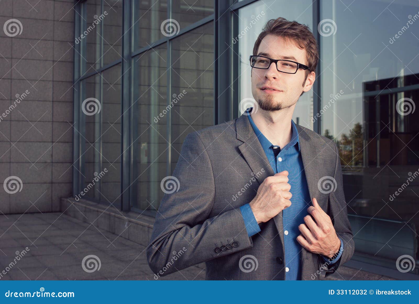 Attractive Young Businessman Looking Satisfied Stock Photo - Image of ...